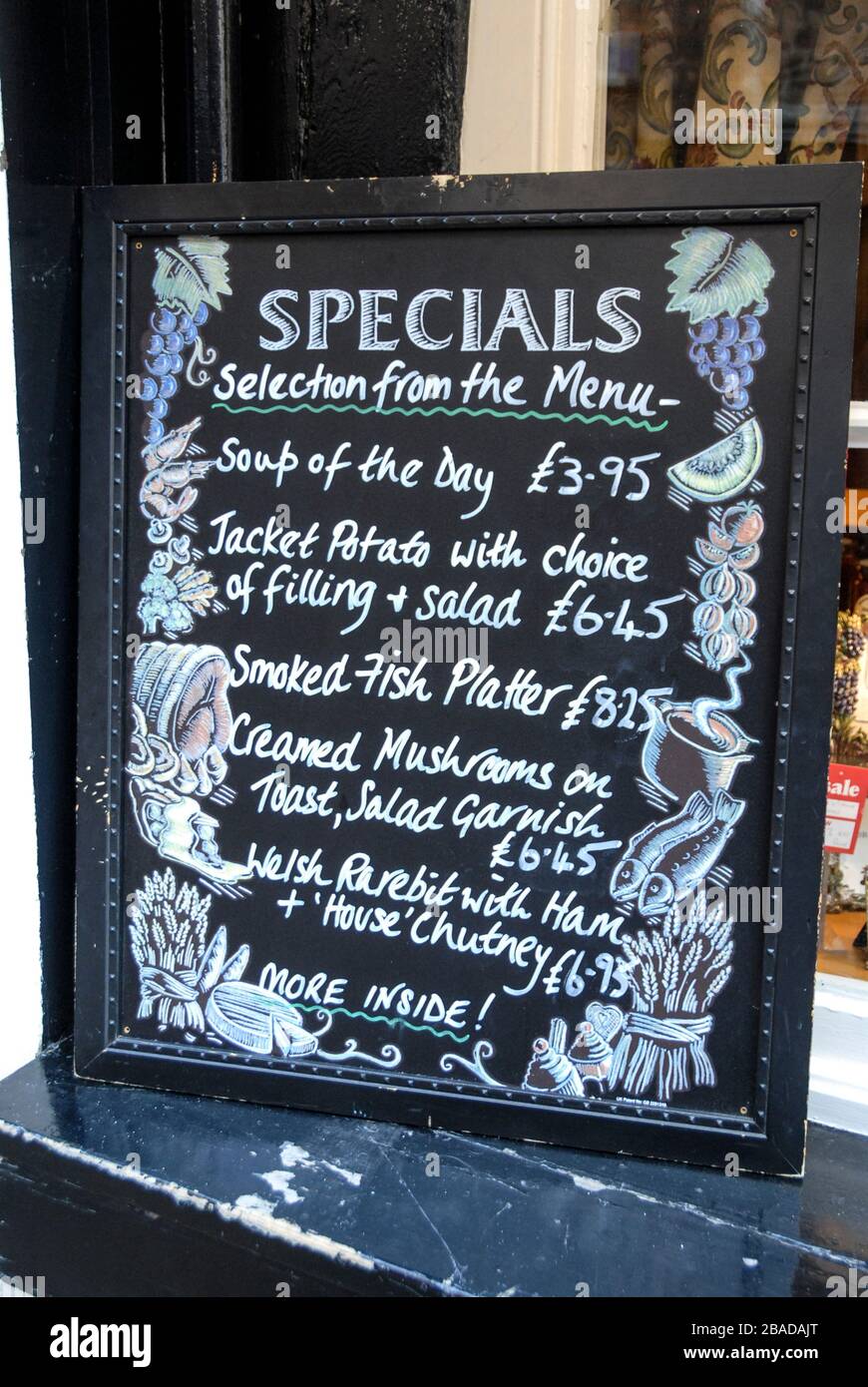 A menu display on a café window sill in the Shambles. The Shambles is ...