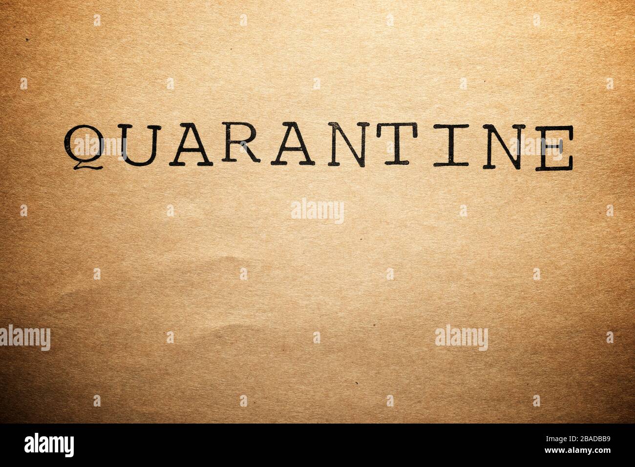 Quarantine word on a brown paper Stock Photo - Alamy