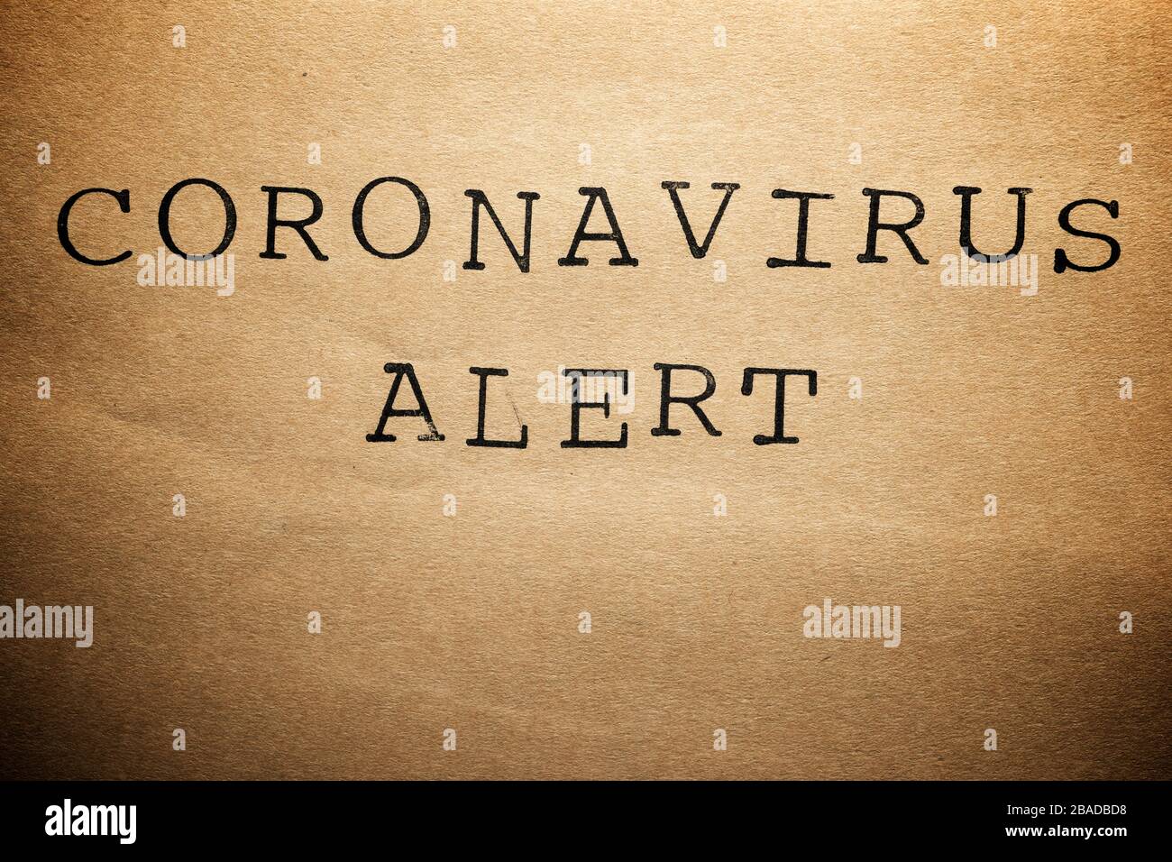 Coronavirus Alert sentence on a brown paper Stock Photo - Alamy