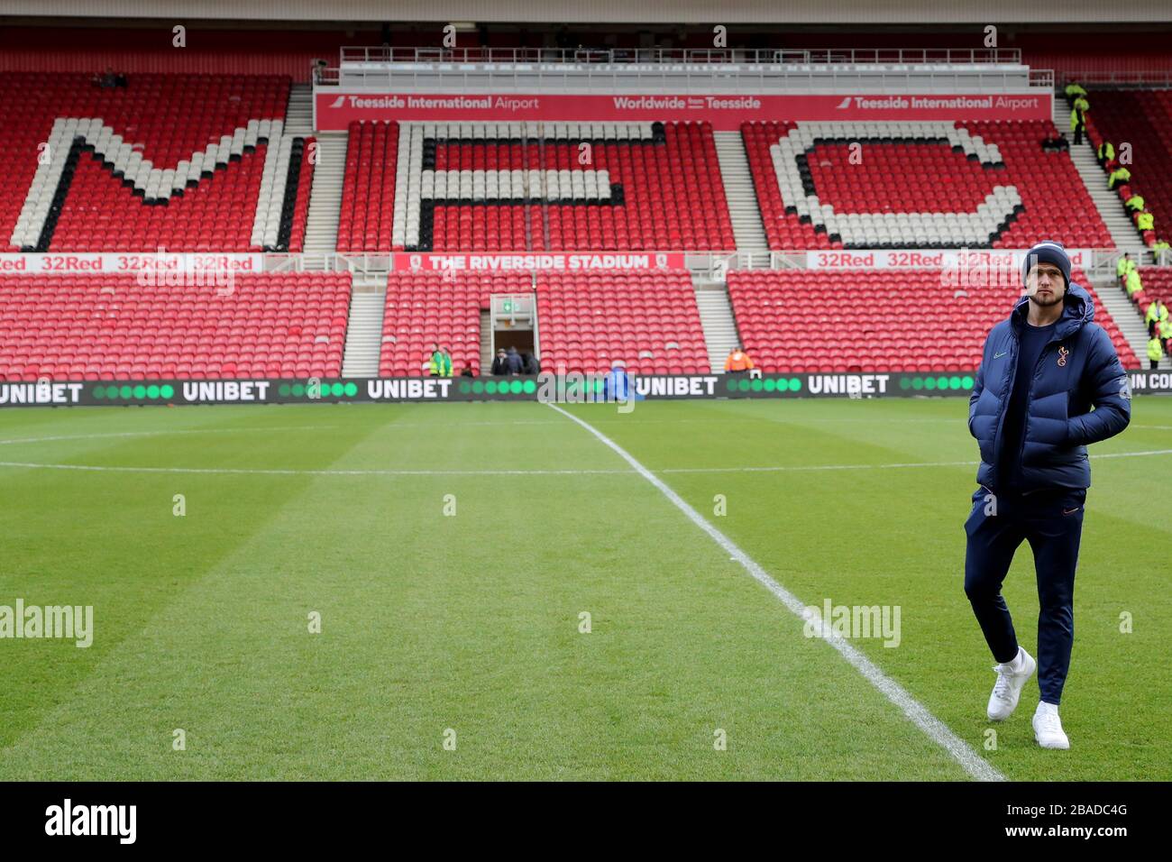 Tottenham Hotspur's Eric Dier inspects the pitch before the game at ...