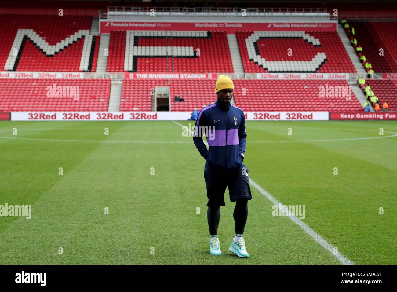 Tottenham Hotspur's Serge Aurier inspects the pitch before the match at ...