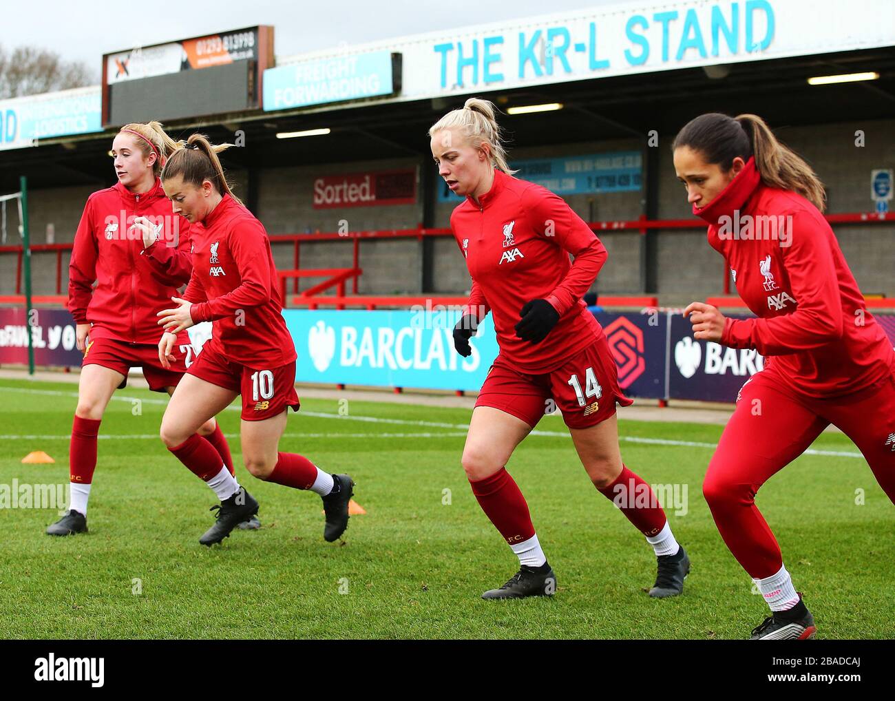 Liverpool players warm up before kick off Stock Photo - Alamy