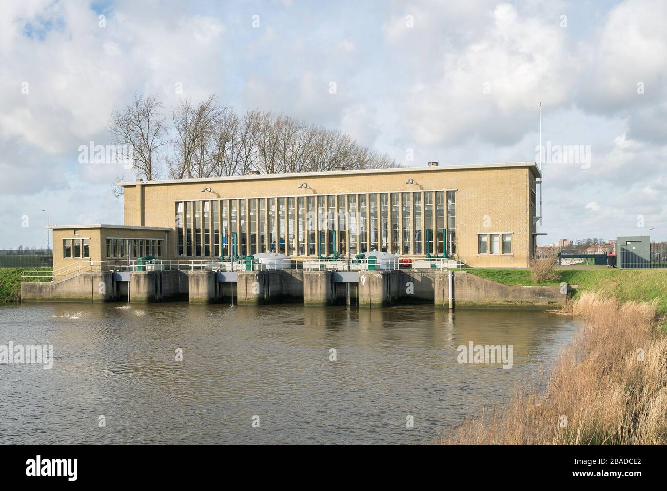 Old water pumping station in the city of Gouda, Netherlands. Water is ...
