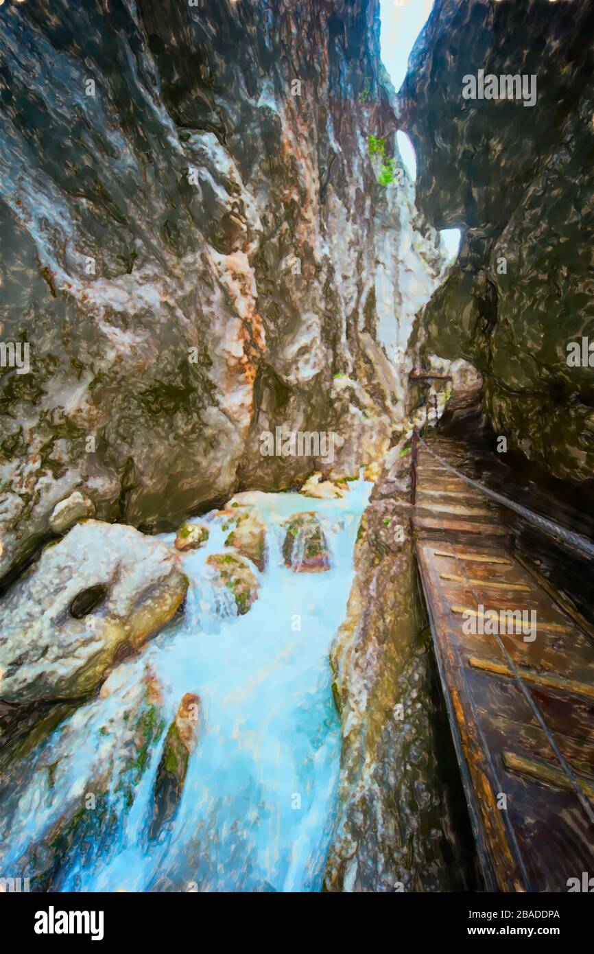 Narrow wobbly path over the Höllental gorge near Garmisch-Partenkirchen ...