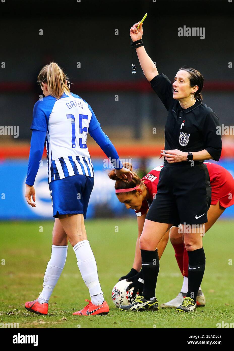 Brighton's Kayleigh Green receives a yellow card off Referee Amy Fearn ...