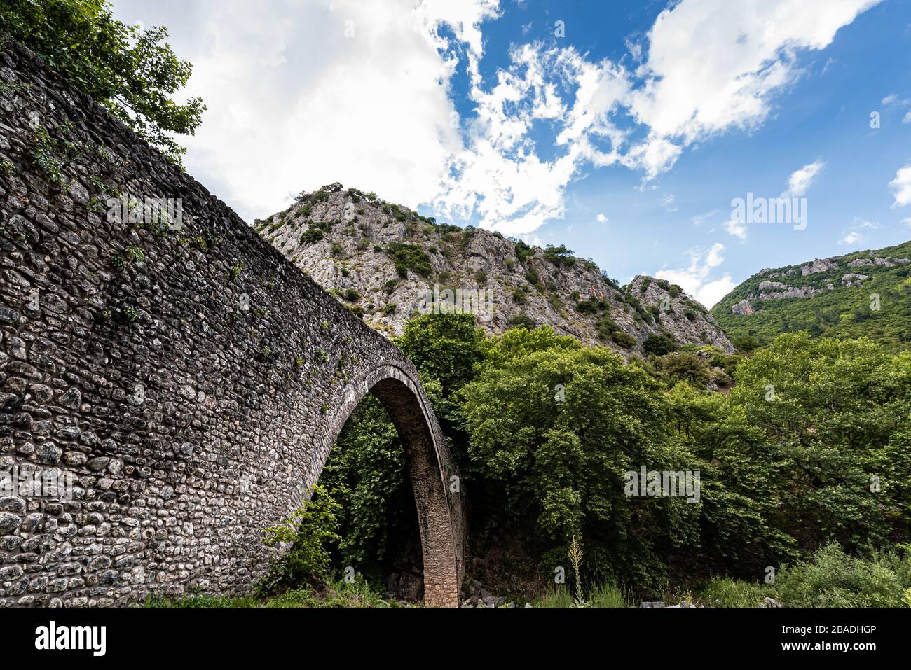 Old arch bridge in Trikala Greece Stock Photo - Alamy
