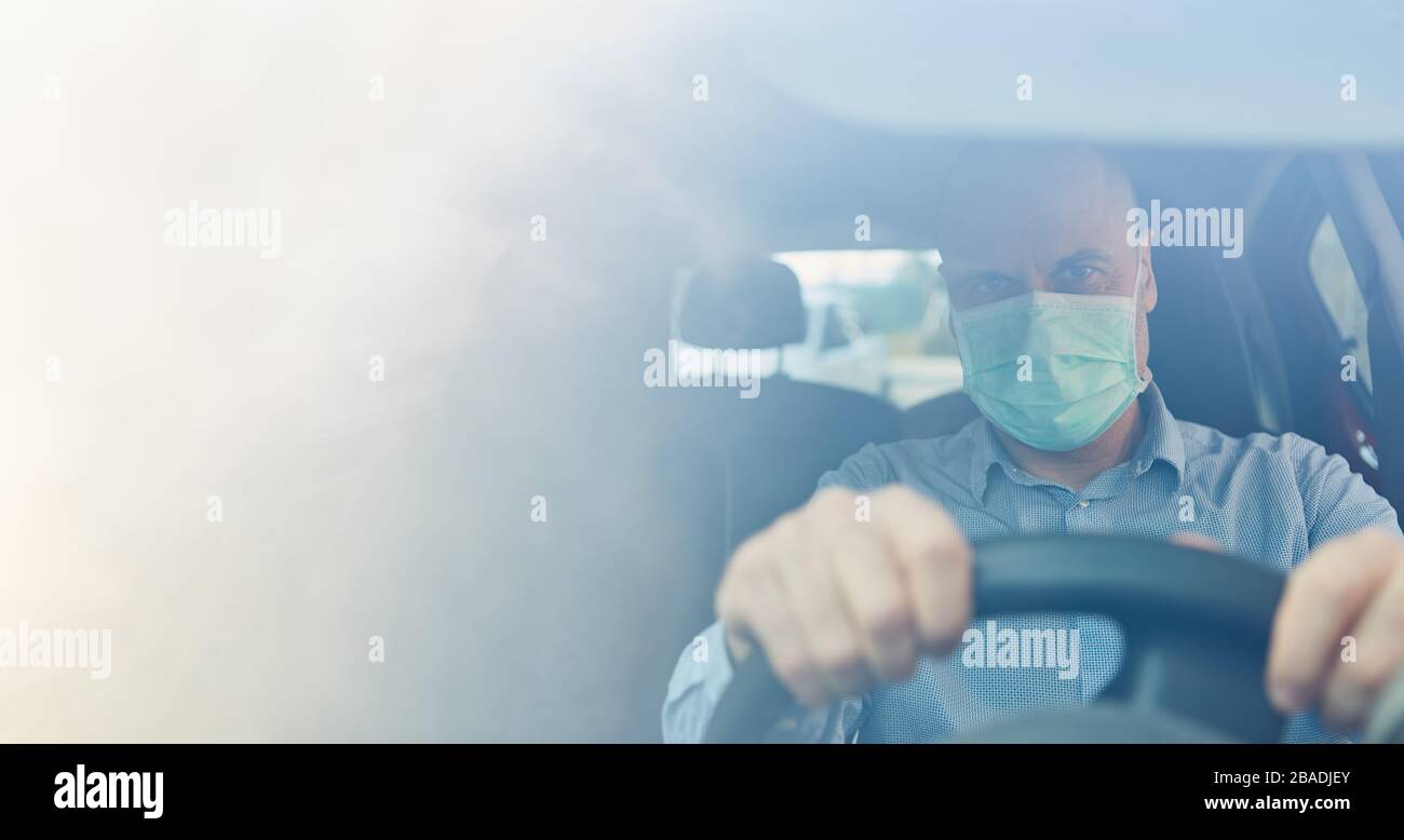 Drivers with face masks while driving the Covid-19 Coronavirus epidemic ...
