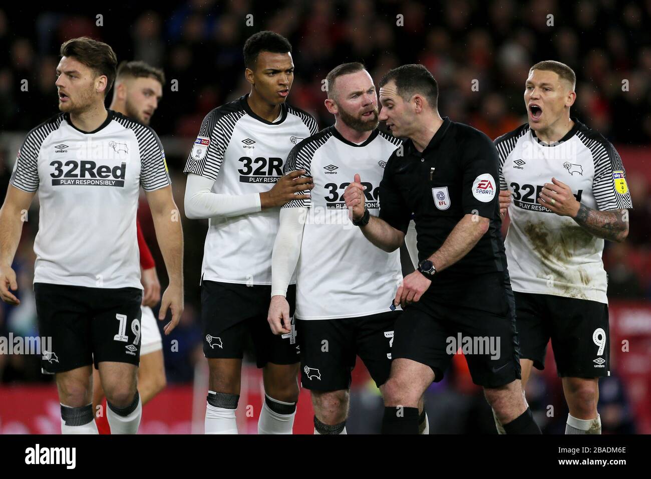 Derby County's Wayne Rooney has words with Referee Tim Robinson Stock ...
