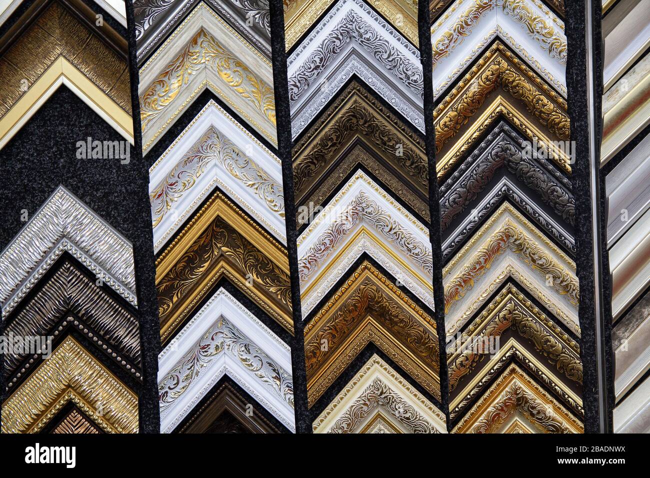 Picture frames samples in a workshop. Colorful samples of picture ...
