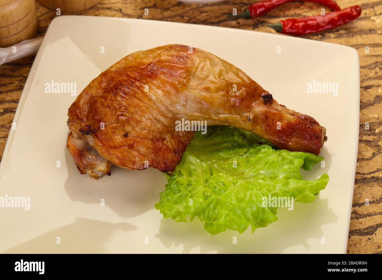 Crispy tasty Roasted chicken leg Stock Photo - Alamy