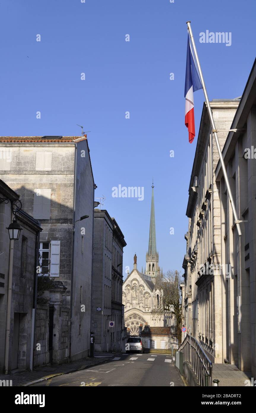Empty street scene with French flag, France Stock Photo - Alamy