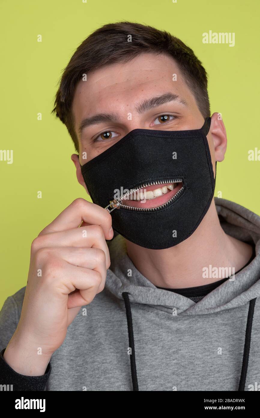 Showing smile. Caucasian man's portrait isolated on yellow studio ...