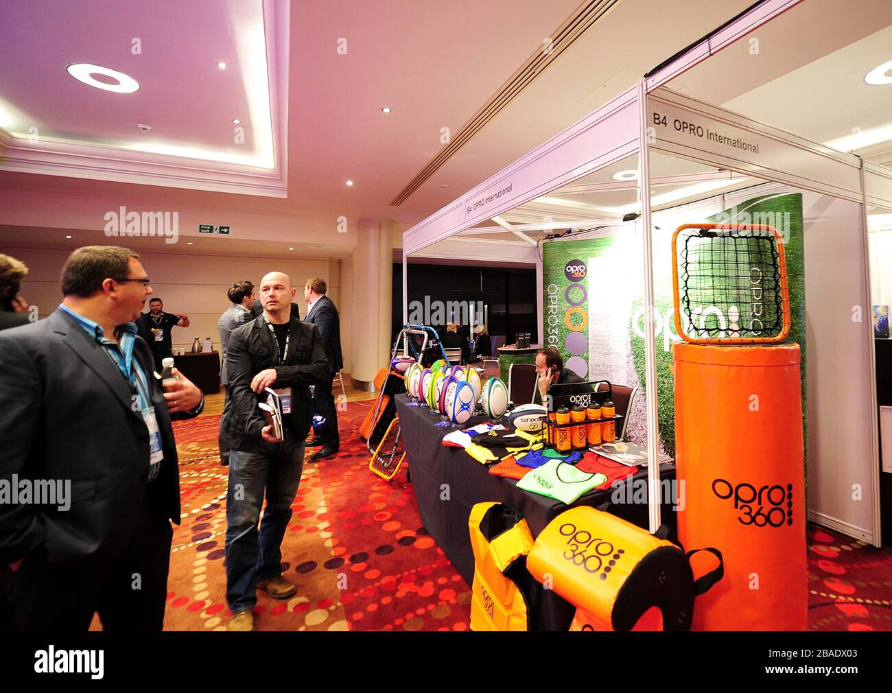 Delegates view the OPRO stand on Day One of the Rugby Expo 2012 Stock ...