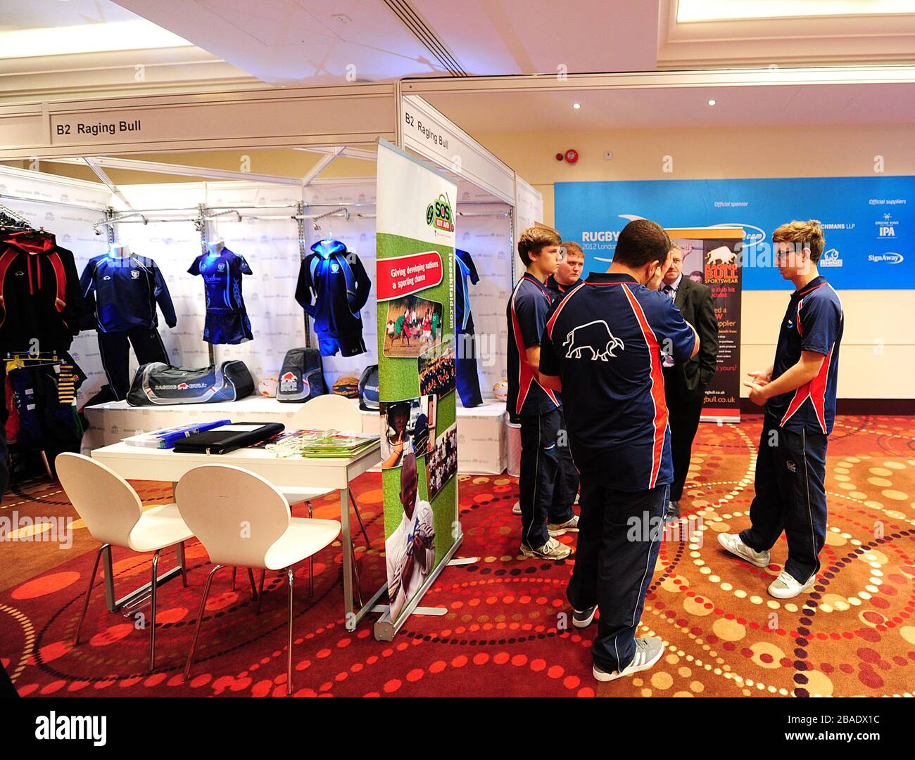 Delegates view the Raging Bull stand on Day One of the Rugby Expo 2012 ...
