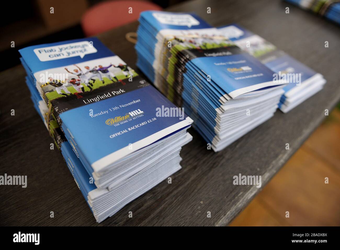William Hill race cards at Lingfield Park Stock Photo - Alamy