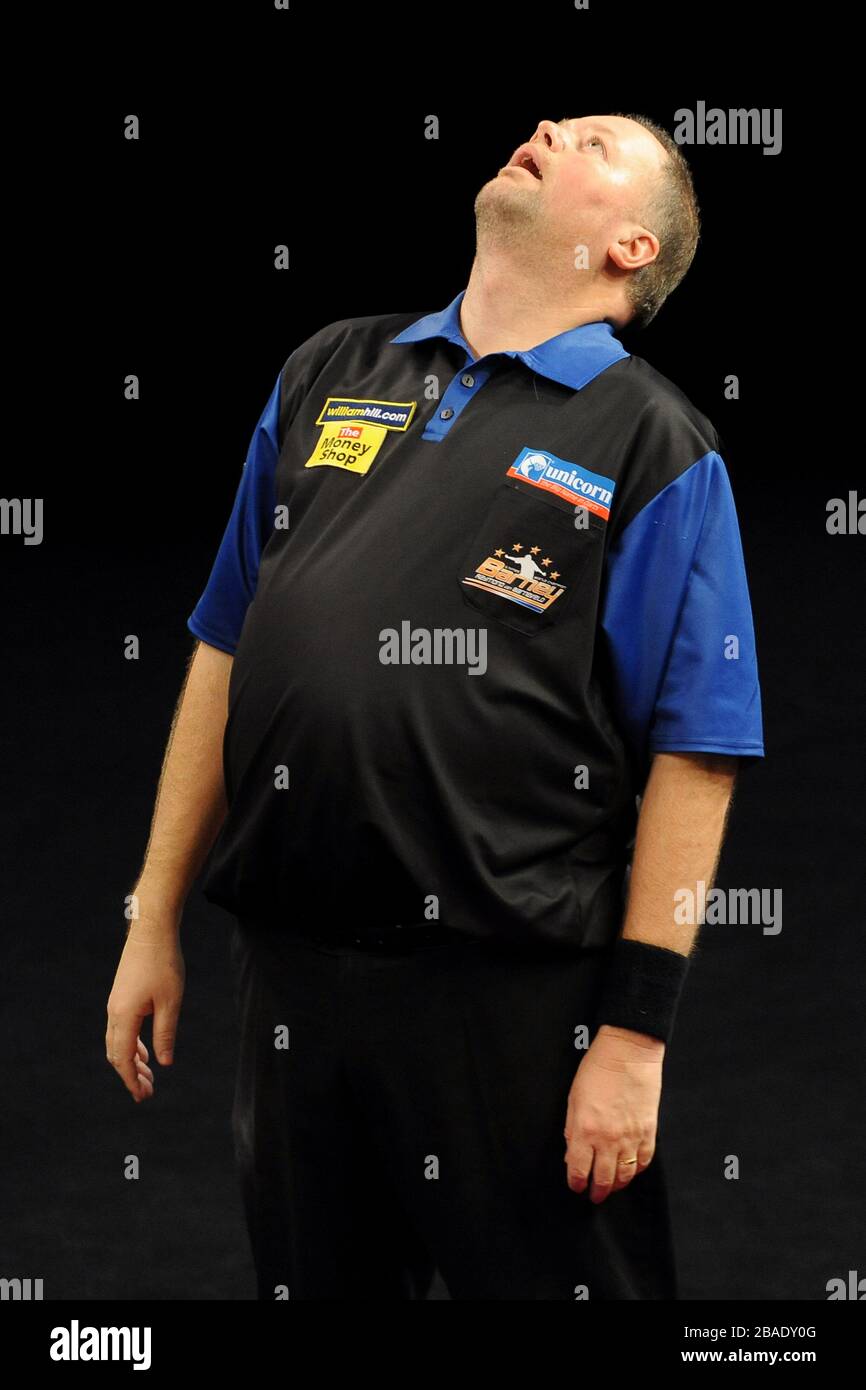 Raymond van Barneveld shows his relief after beating Andy Hamilton to ... Raymond van Barneveld shows his relief after beating Andy Hamilton to ...