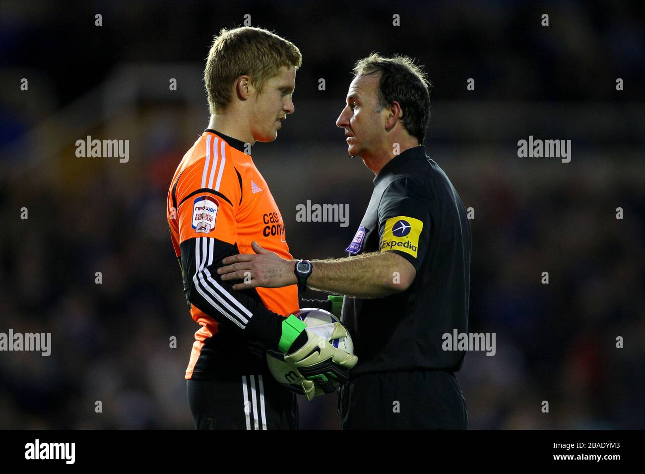 Hull City goalkeeper Ben Amos (left) with match referee Mick Russell ...