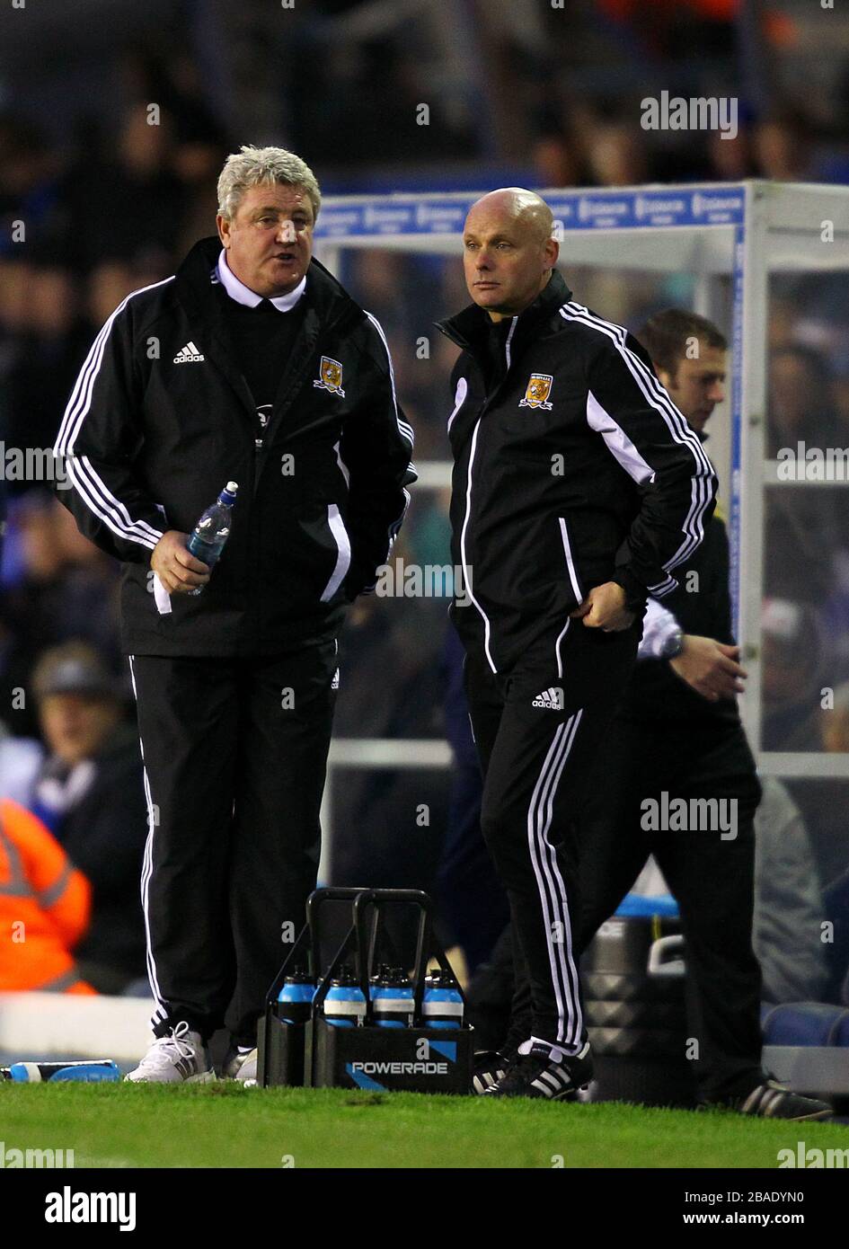 Hull City manager Steve Bruce (left) with assistant manager Steve Agnew ...