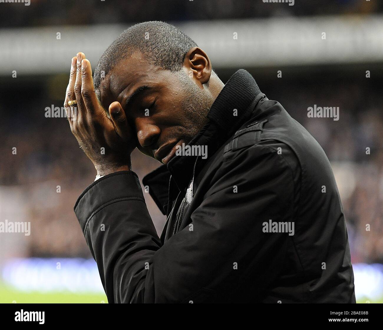 Former footballer Fabrice Muamba shows emotion after a parade around ...