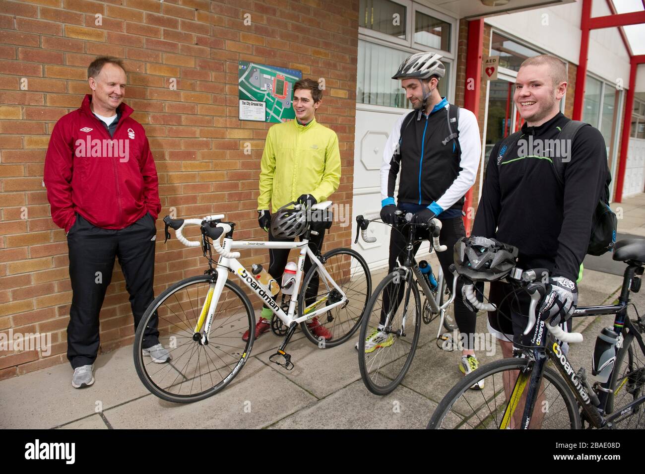 Nottingham Forest manager Sean O'Driscoll speaks with cyclists Rowan ...