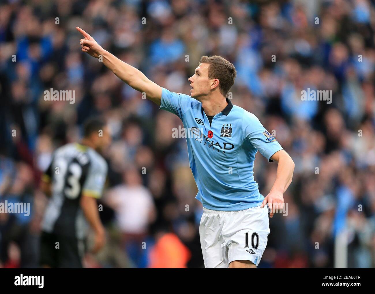 Manchester City's Edin Dzeko celebrates after scoring his team's second ...