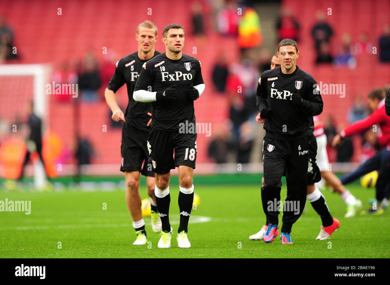 Left and aaron hughes centre during warm up hi-res stock photography ...
