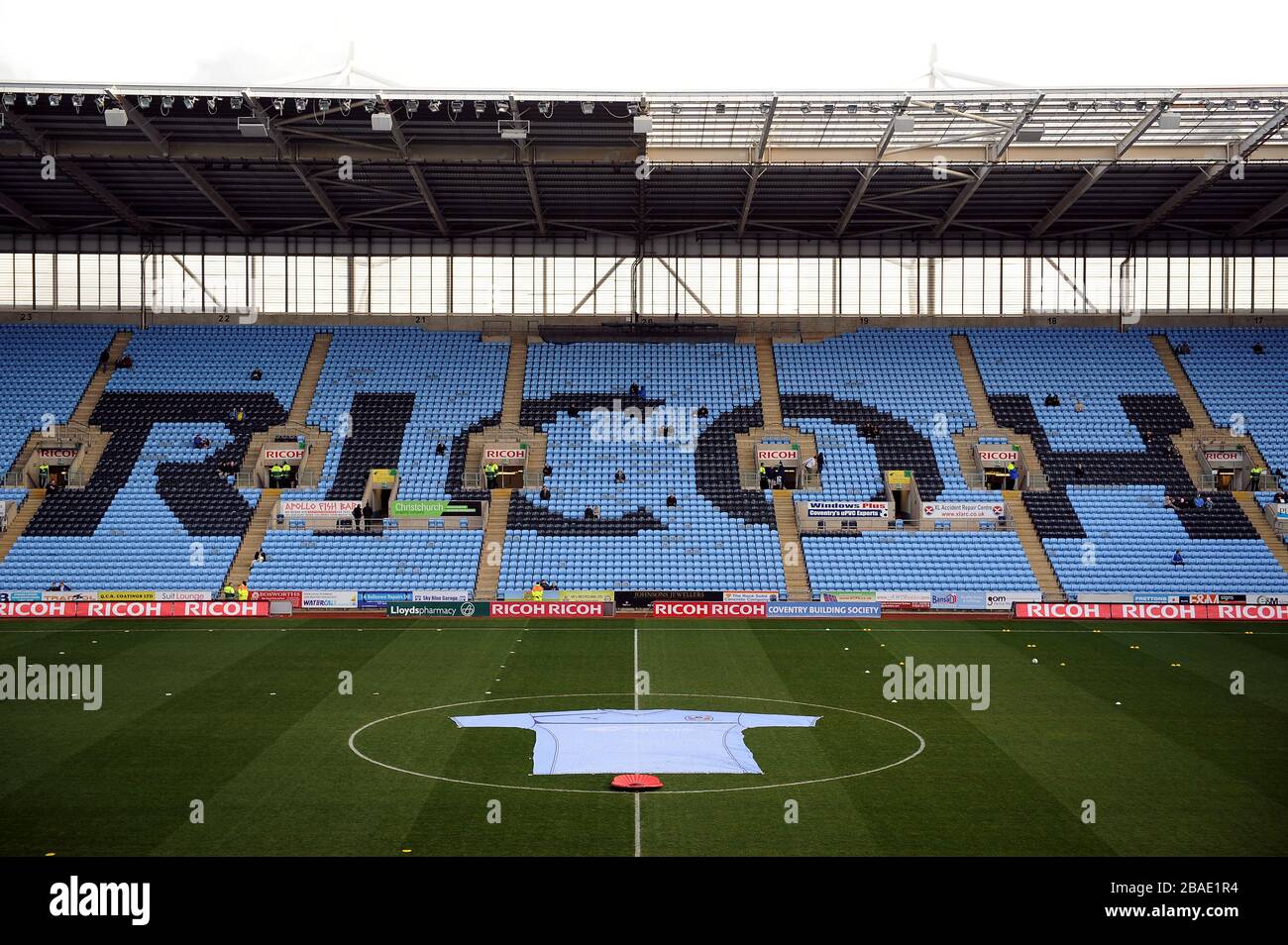 Giant Coventry City shirt and Poppy on the pitch at the Ricoh Arena ...