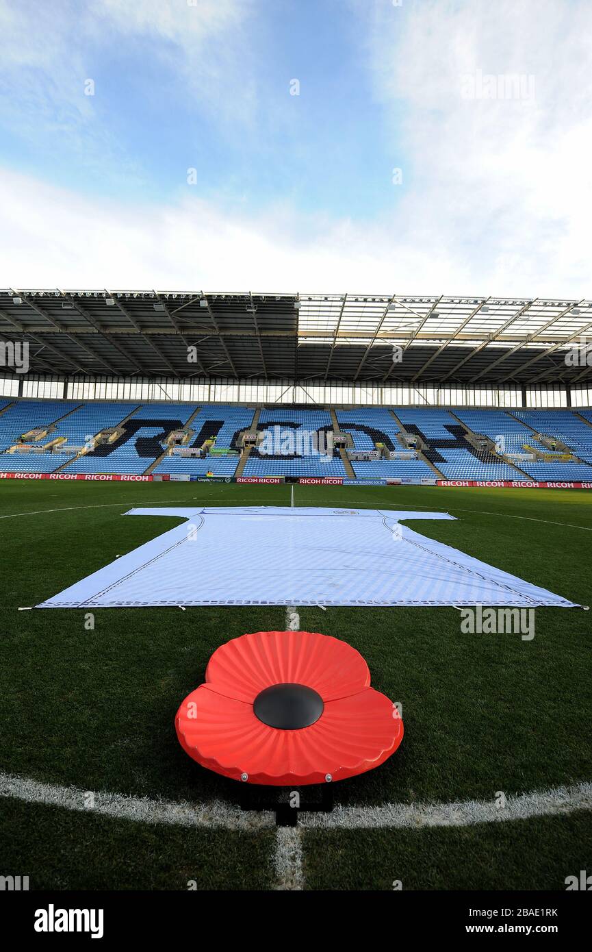 Giant Coventry City shirt and Poppy on the pitch at the Ricoh Arena ...