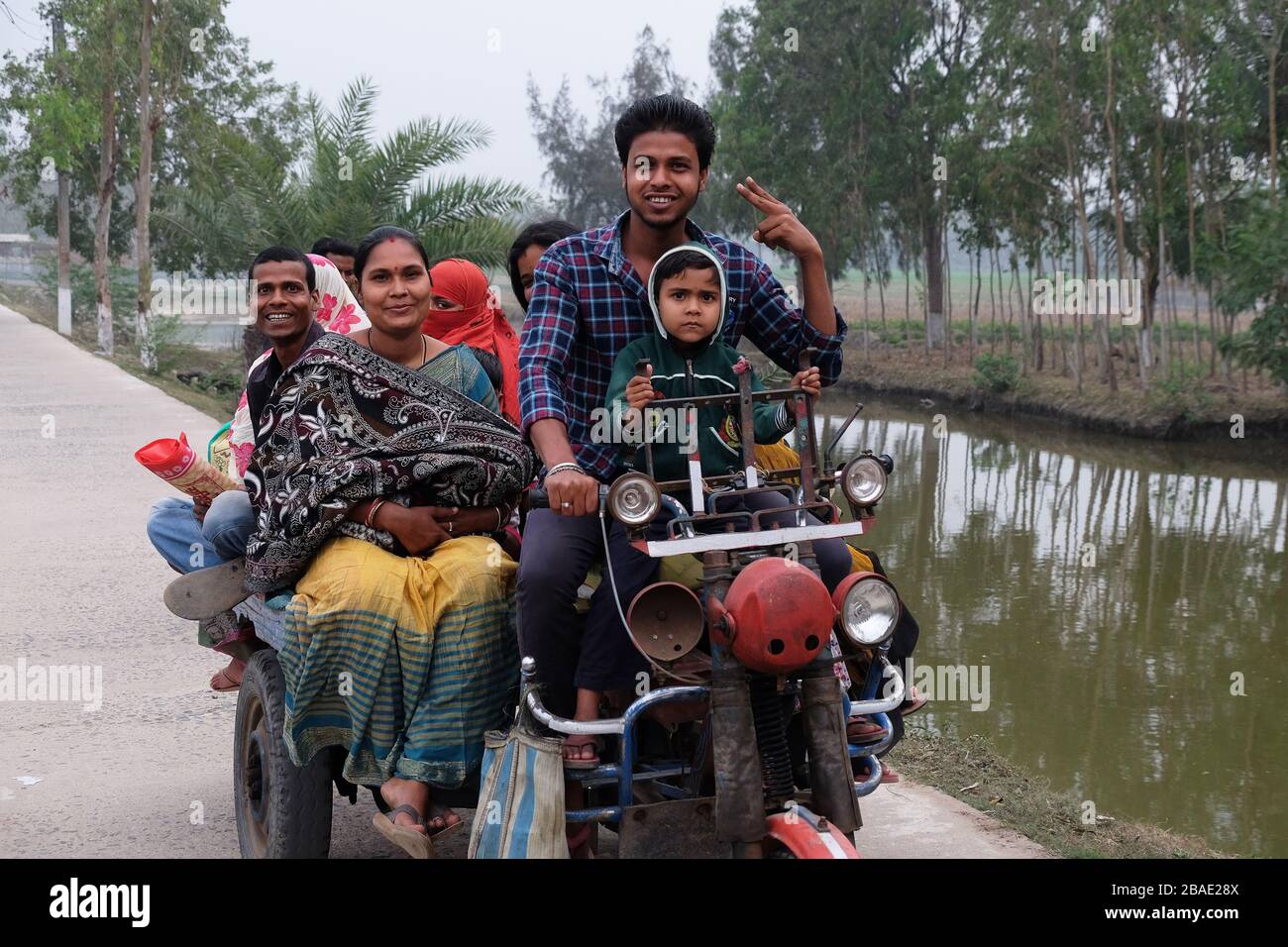 Children ride cycle rickshaw hi-res stock photography and images - Alamy