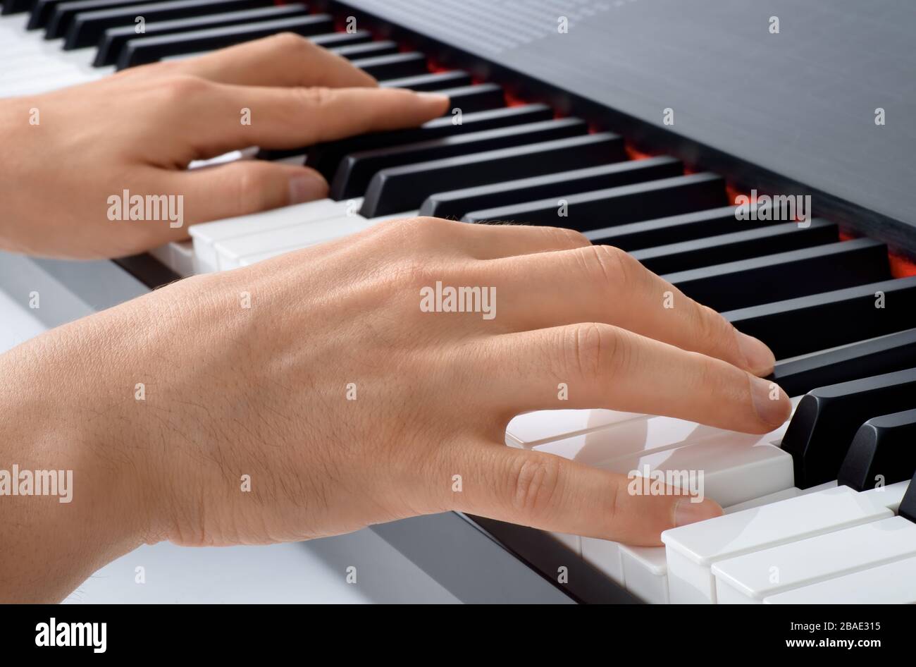 Hands playing classical piano hi-res stock photography and images - Alamy