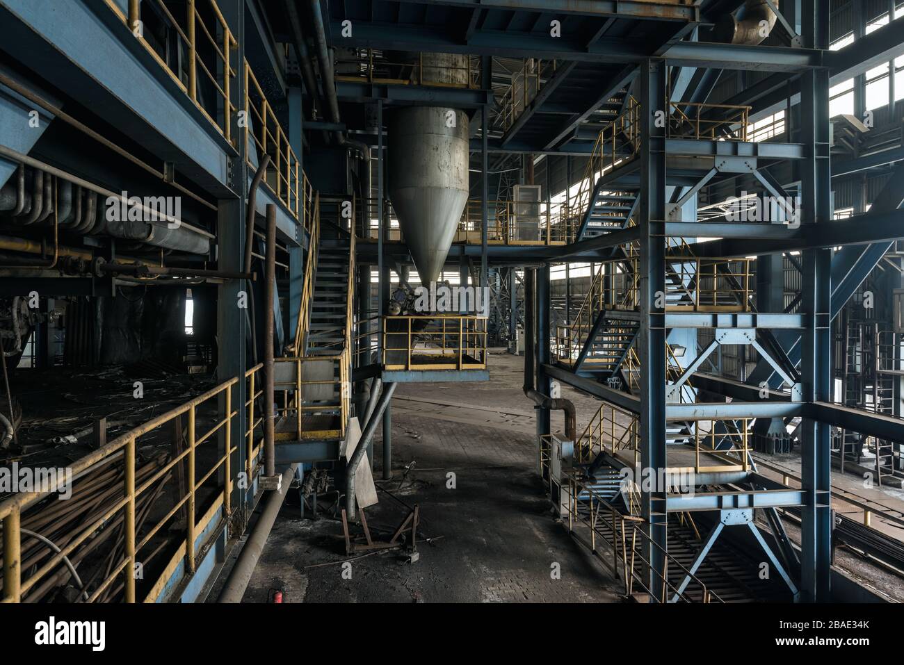 Interior of an old abandoned industrial steel factory Stock Photo - Alamy