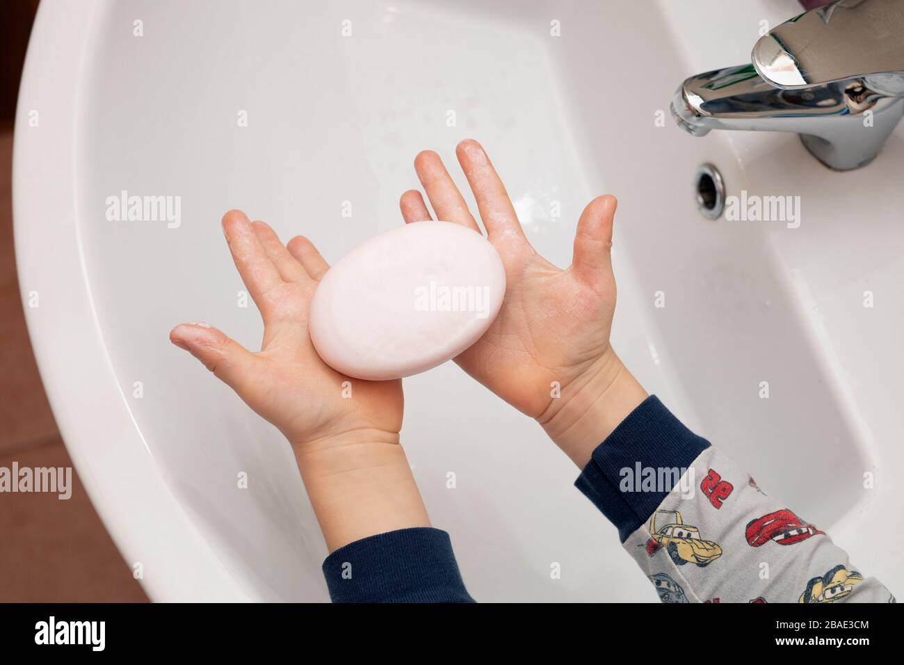 Washing hands. Hygiene and cleanliness. Bathroom background Stock Photo ...
