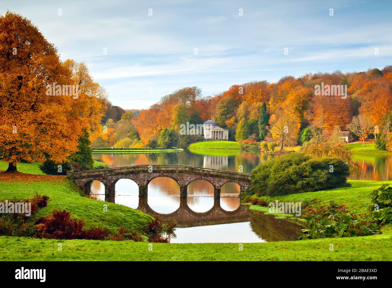 Brilliant autumn colour surrounds the lake and Palladian Bridge in ...