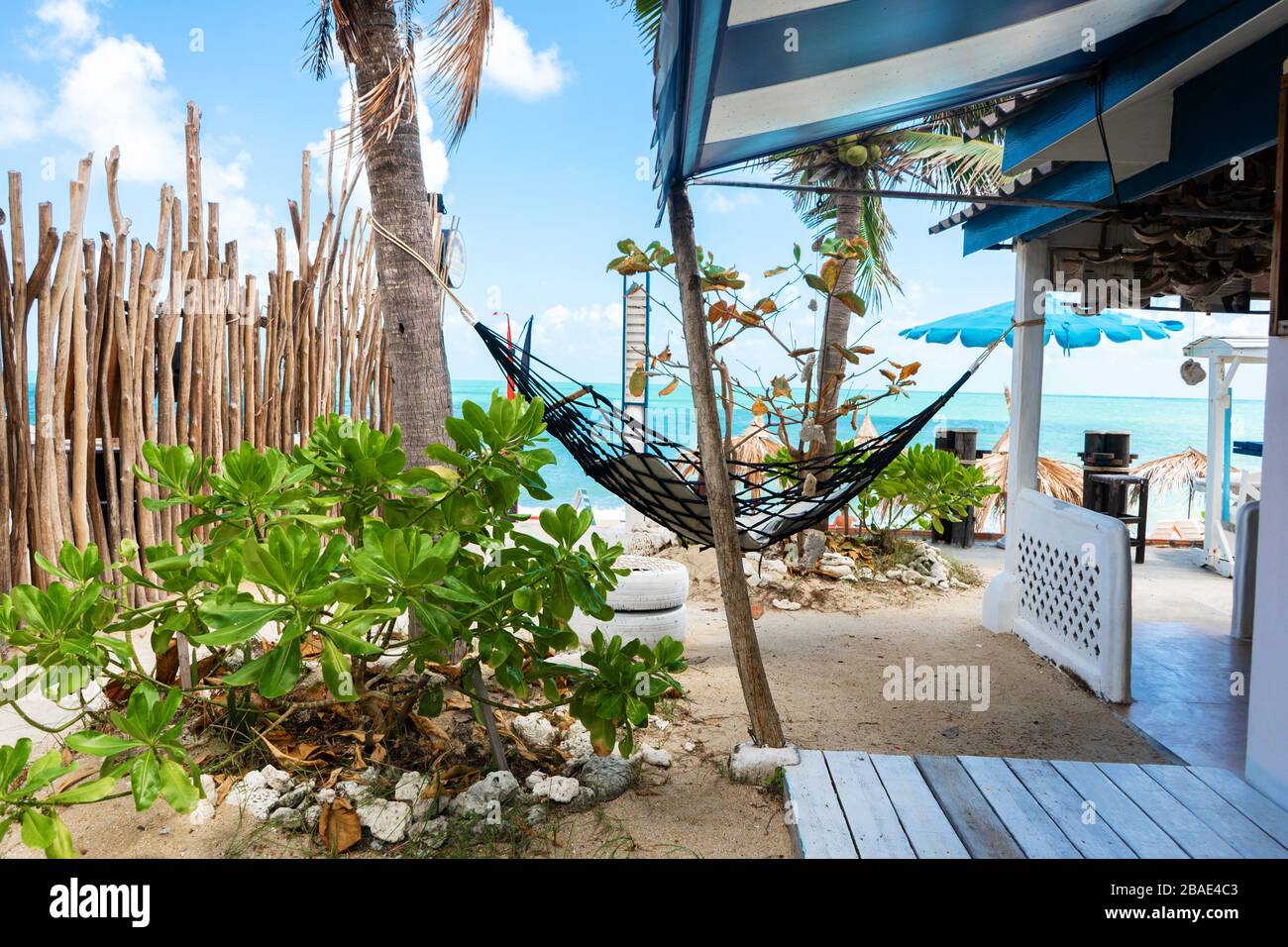Hammock in the courtyard of the house with ocean views. Life in the ...