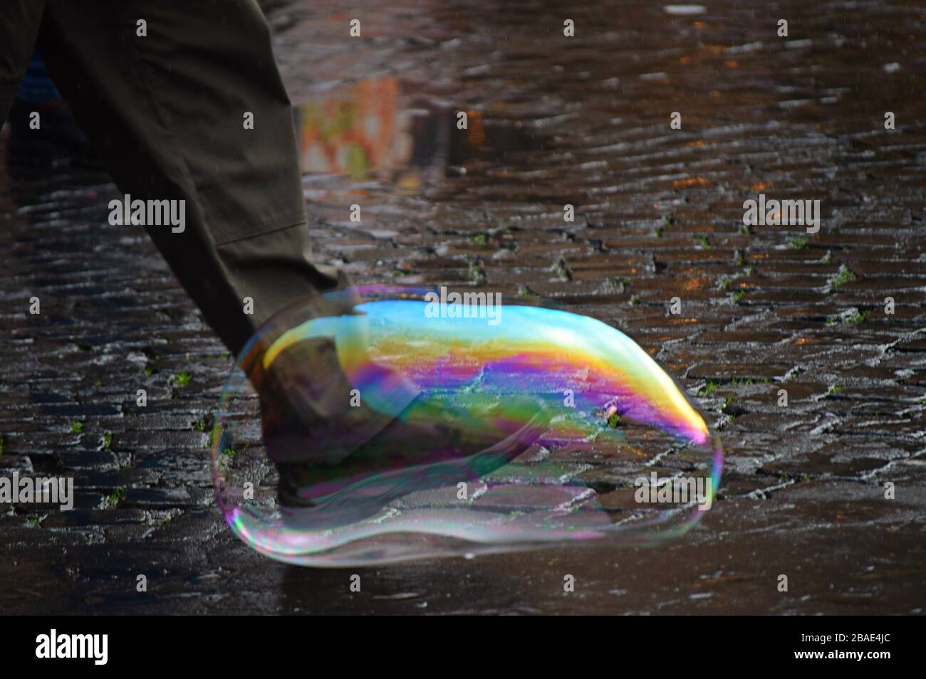 bubble with mans foot Stock Photo - Alamy