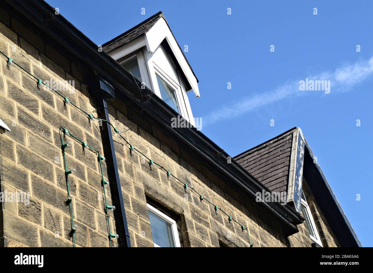 Dormer windows on stone building Stock Photo - Alamy