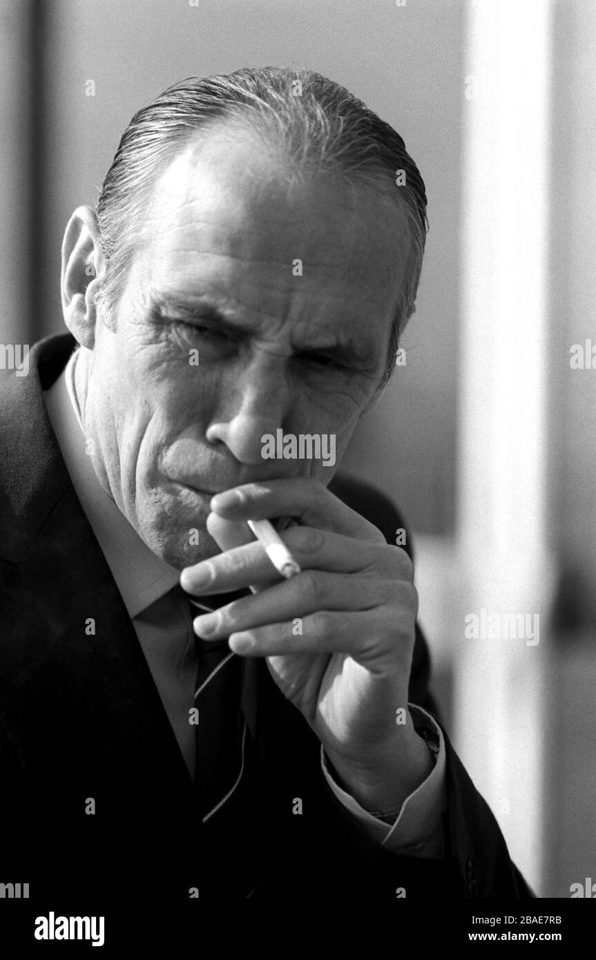 Italy Coach Enzo Bearzot drags on his cigarette Stock Photo - Alamy
