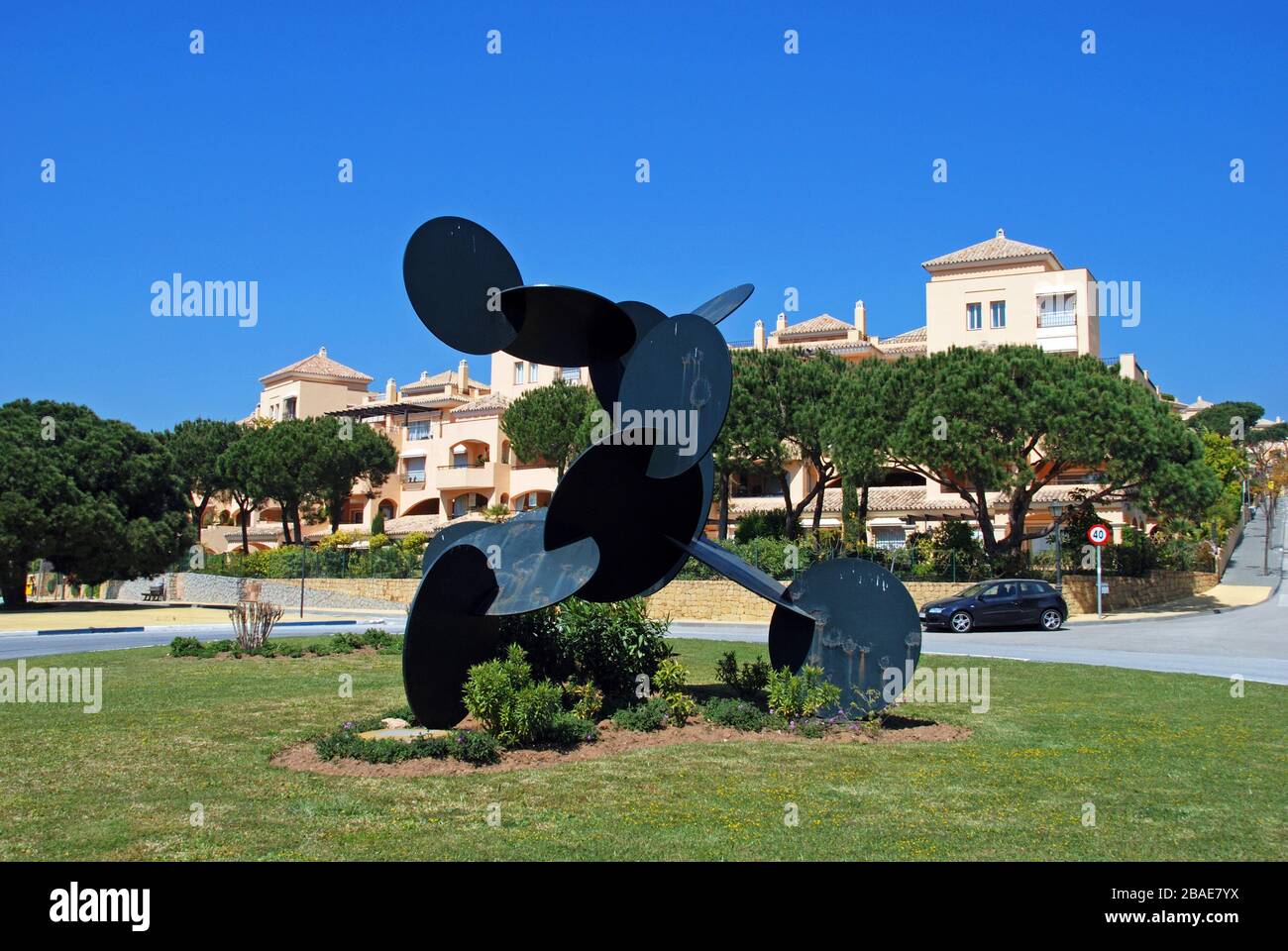 Modern metal sculpture on a traffic roundabout, Elviria, Andalusia ...