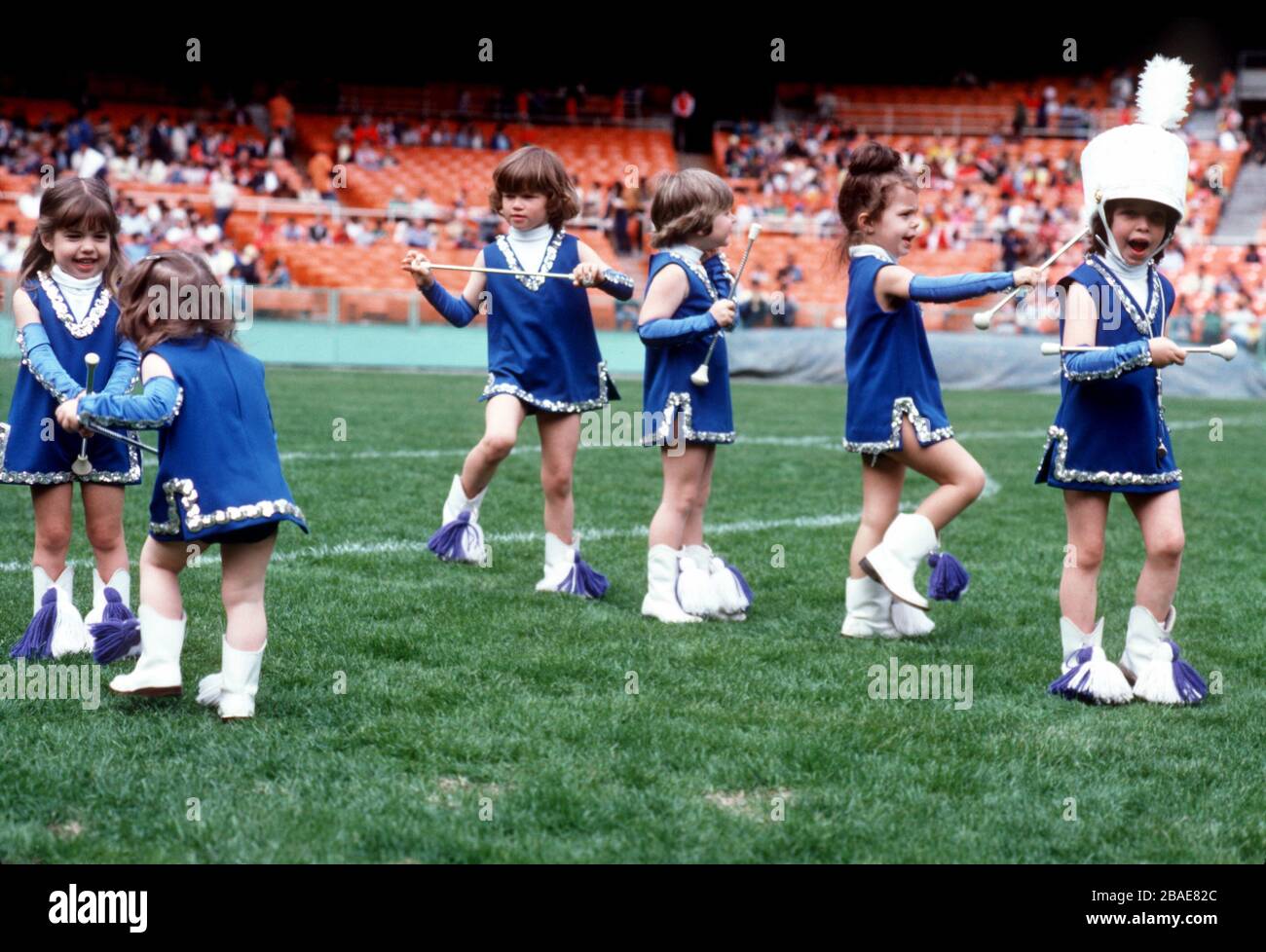 A group of young majorettes perfect their moves on the pitch at RFK ...