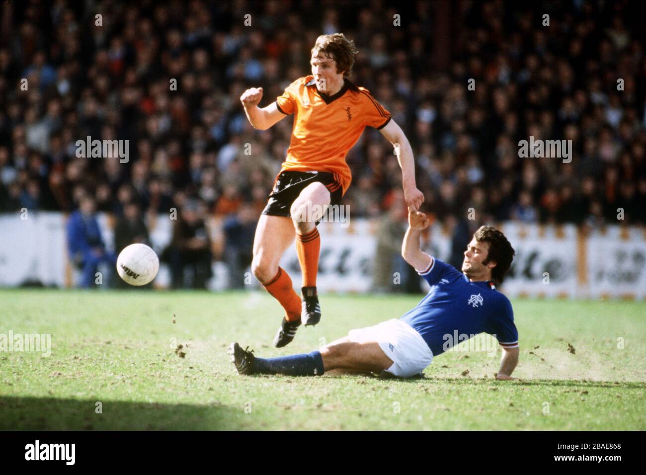 Rangers' Davie Cooper (r) slide tackles Dundee United's Derek Stark (l ...
