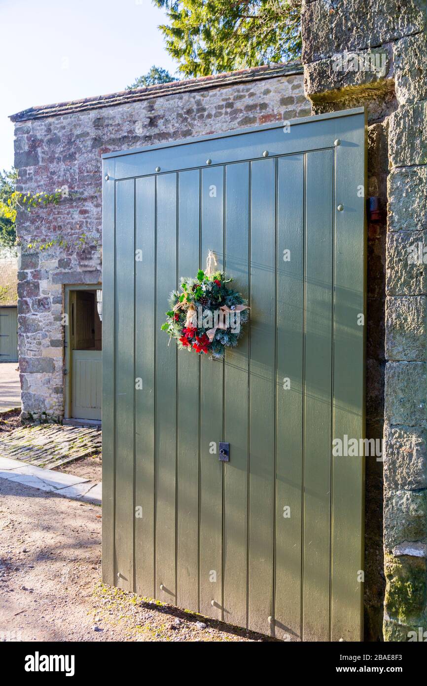 Decorative Christmas wreath on a gate at Stourhead House, Wiltshire ...