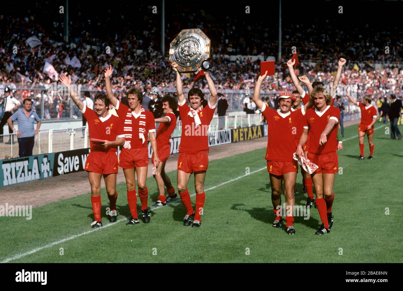 Liverpool players celebrate with the charity shield. (l-R) Jimmy Case ...