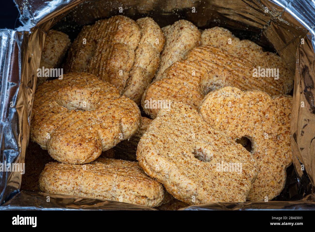 Homemade biscuits in aluminum paper bag, food photography Stock Photo ...