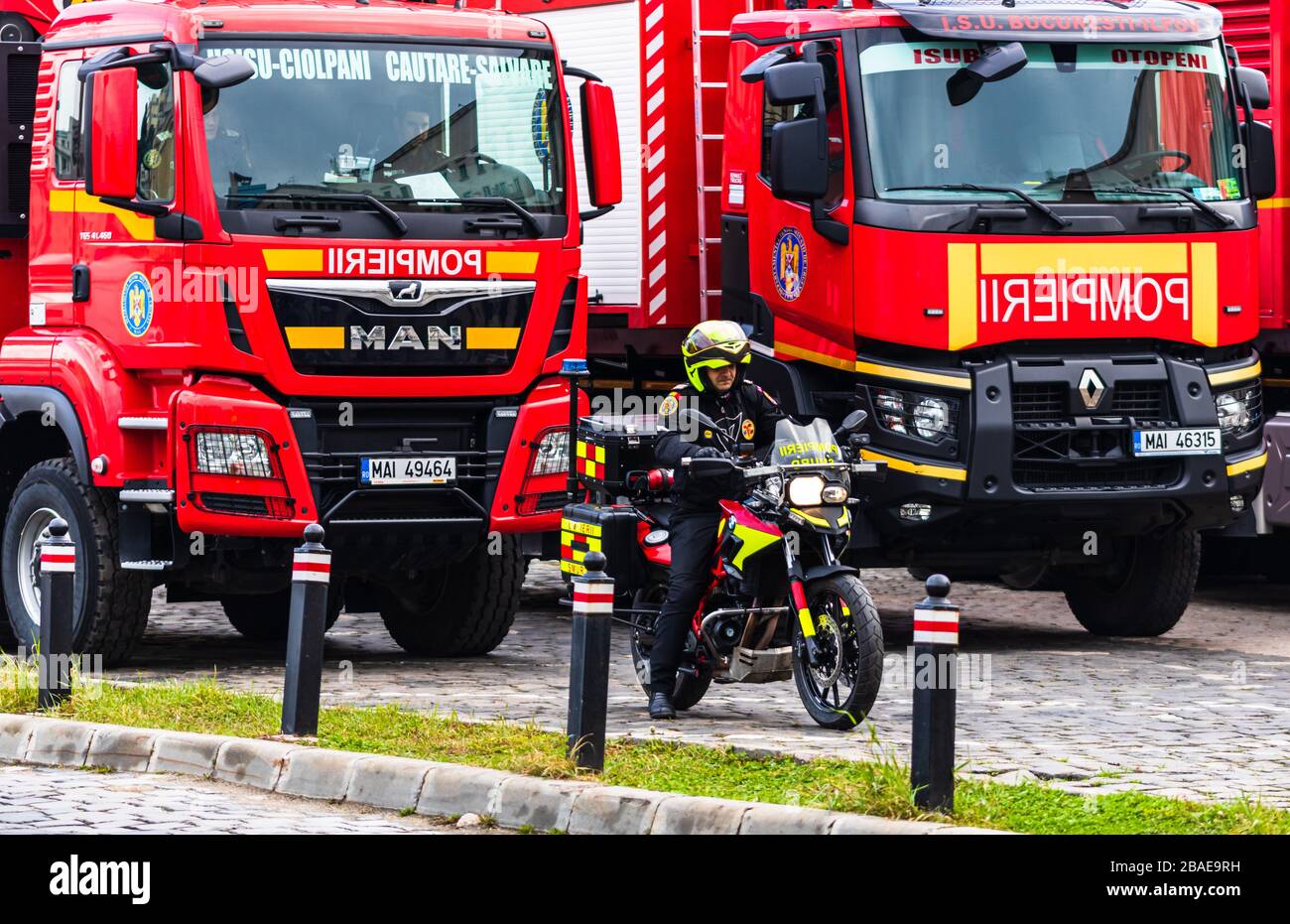 Romanian Firefighting emergency firemen (Pompierii) on motorbike parked ...