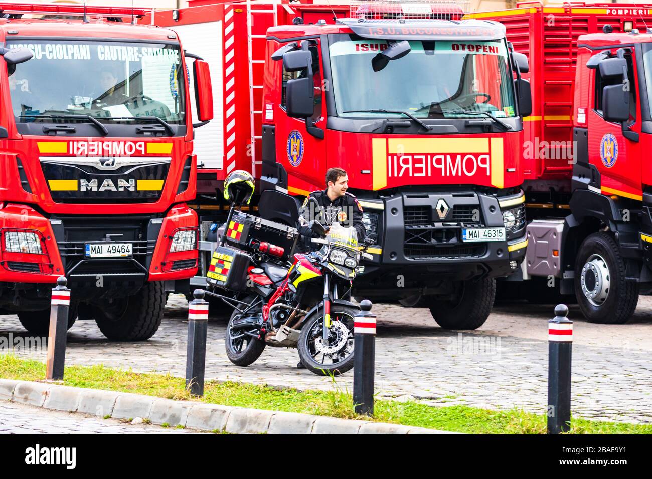 Romanian Firefighting emergency firemen (Pompierii) on motorbike parked ...