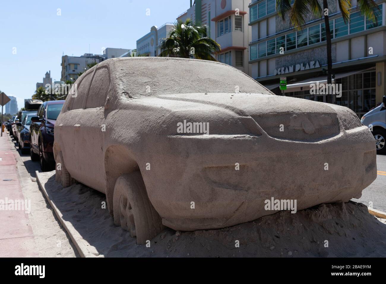 A life-size sand car in a sandpit, South Beach, Miami Beach, Florida ...