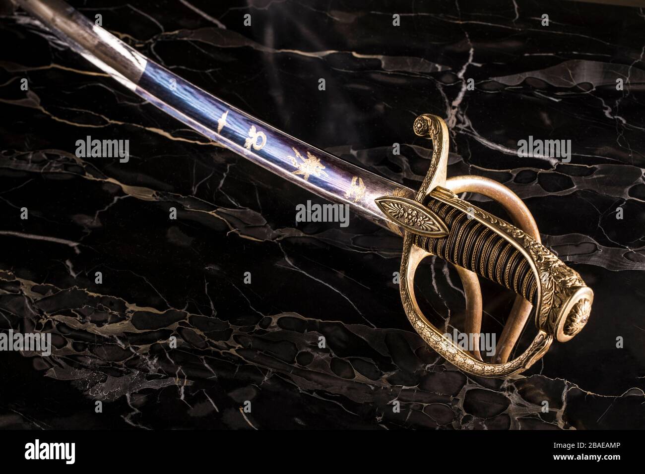French officer saber (sabre) an black marble background.The 19th ...