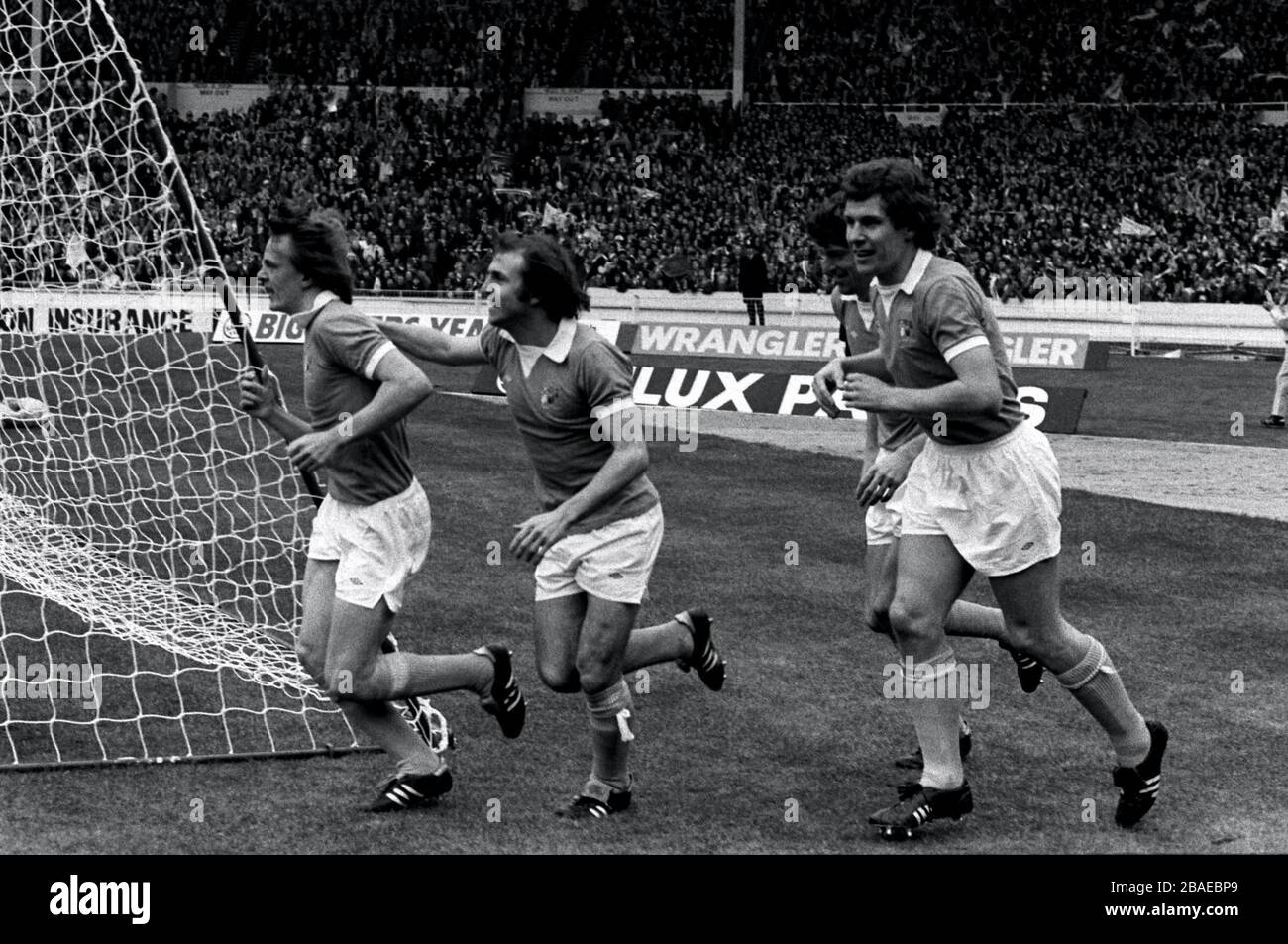 (L-R) Manchester City's Peter Barnes celebrates his goal with teammates ...