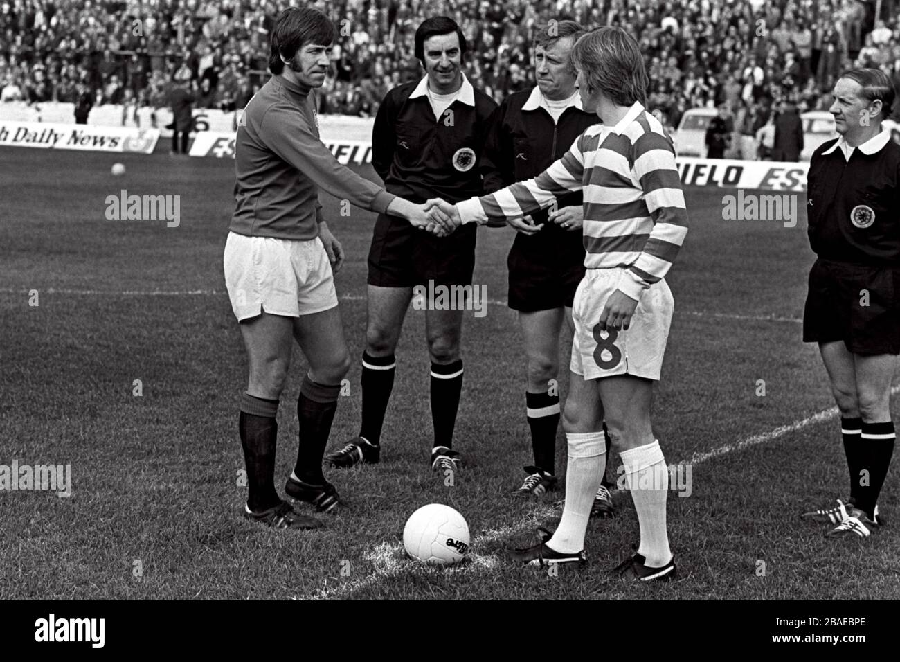 Rangers captain John Greig (l) shakes hands with Celtic captain Kenny ...