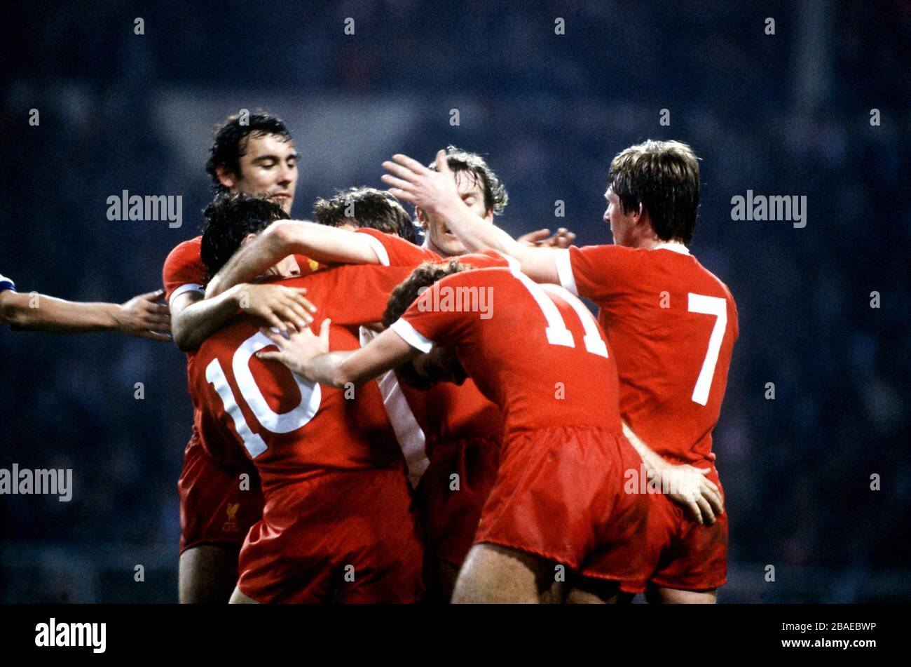 Liverpool players celebrate the winning goal, scored by Kenny Dalglish ...